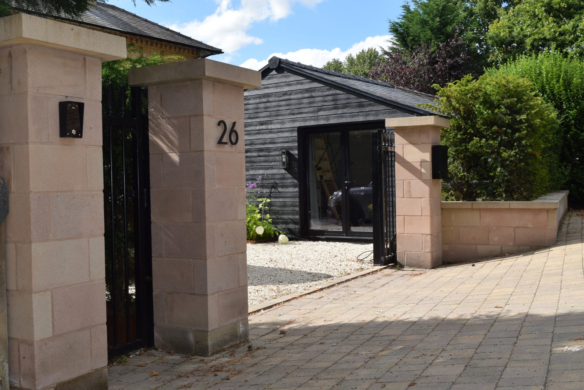 Alderley Edge garage conversion & Cedral cladding boards. - Mark A Burgess